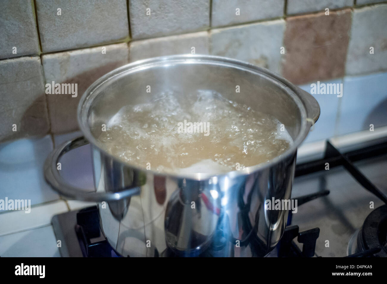 pot with boiling water Stock Photo - Alamy
