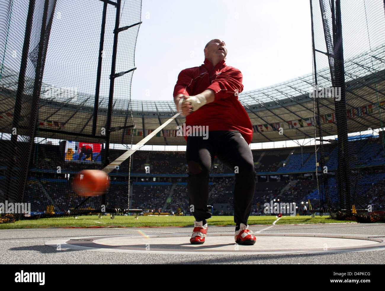 Szymon Ziolkowski of Poland competes in the Hammer Throw qualification ...