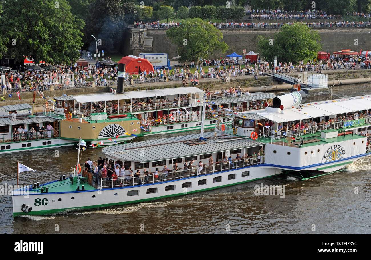 Historic steamers are pictured during their traditional parade on the ...