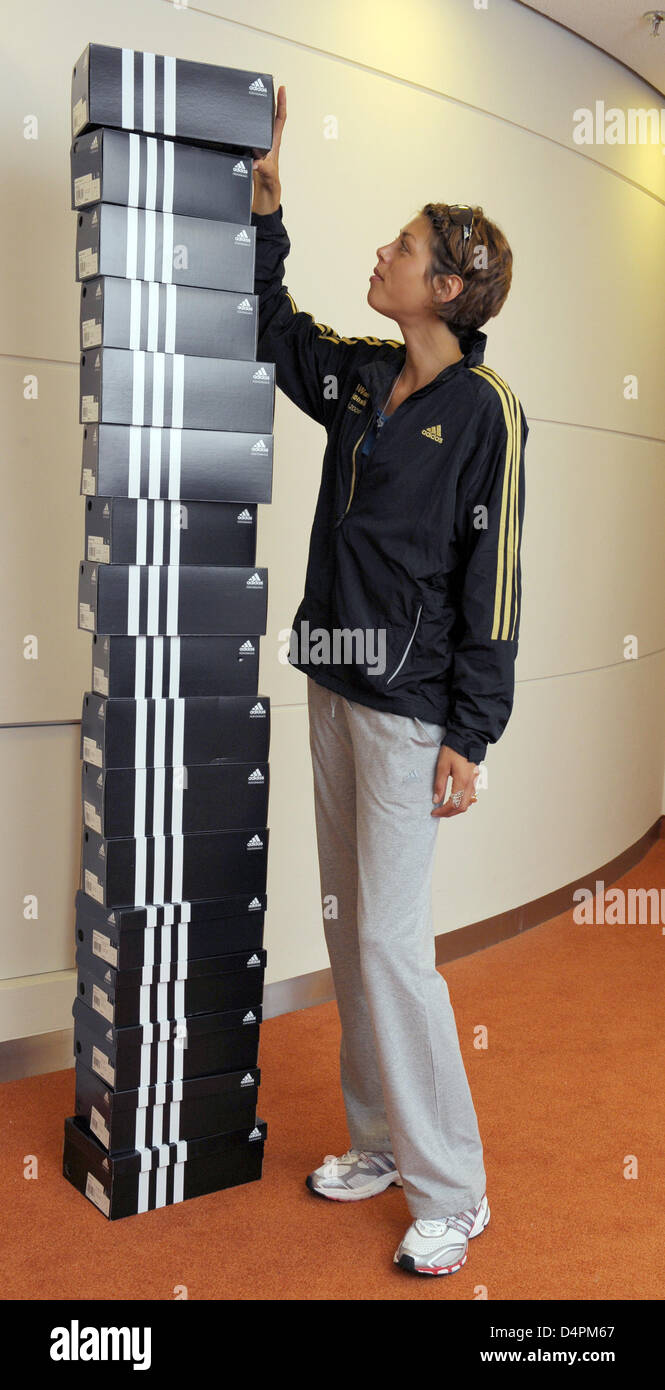 Croatian high jumper Blanka Vlasic poses next to a 2.10m-high pile of ...