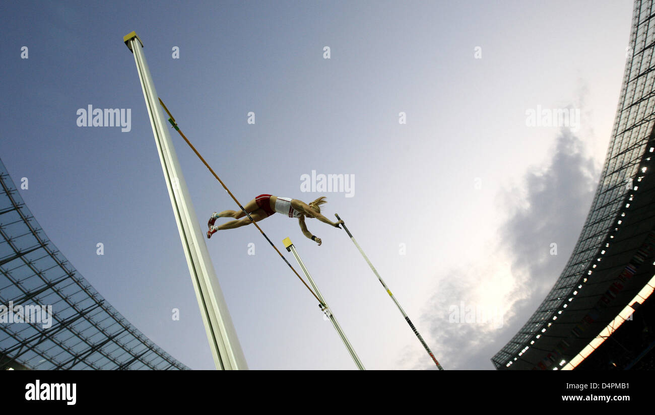 Poland?s Anna Rogowska clears the bar during the Pole Vault final at ...