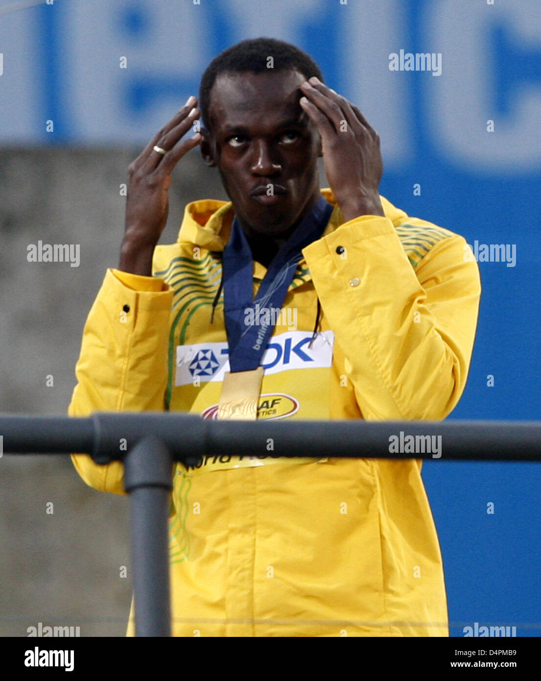Jamaica?s Usain Bolt poses during the medal ceremony of the 100m finals ...