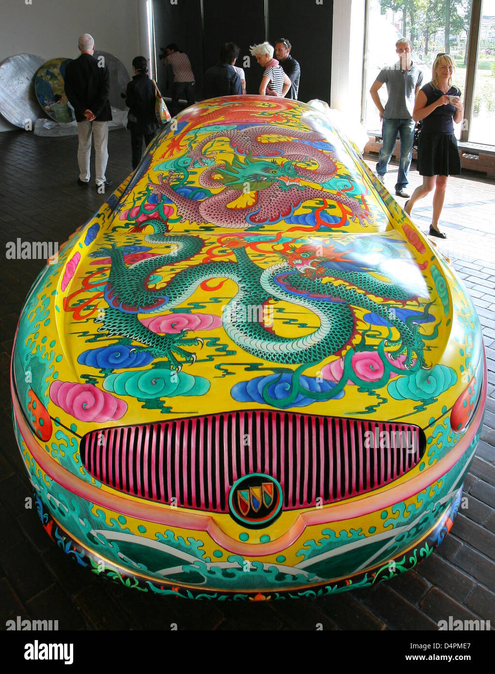 The artwork ?Porcelain Car? (2008) by Mai Jun is unwrapped in Art Hall ...
