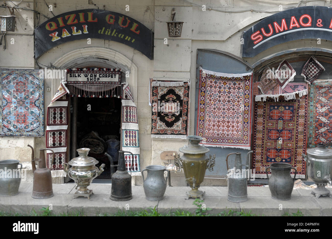 Two shops of carpet dealers in the historic Old Town of Baku ...