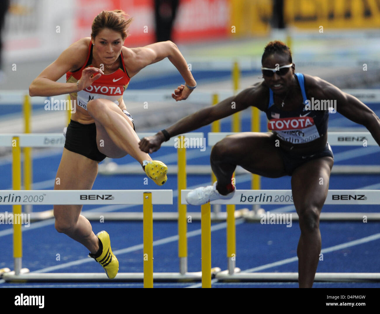 Carolin Nytra (L) of Germany and Damu Cherry of USA compete in the 100m ...