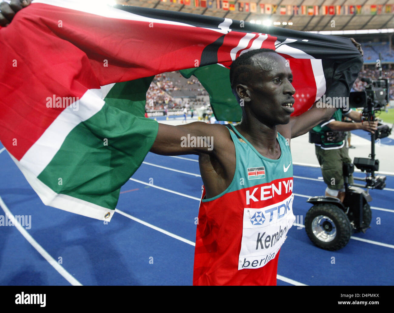 Kenyan Ezekiel Kemboi celebrates his victory in the men?s 3000m ...