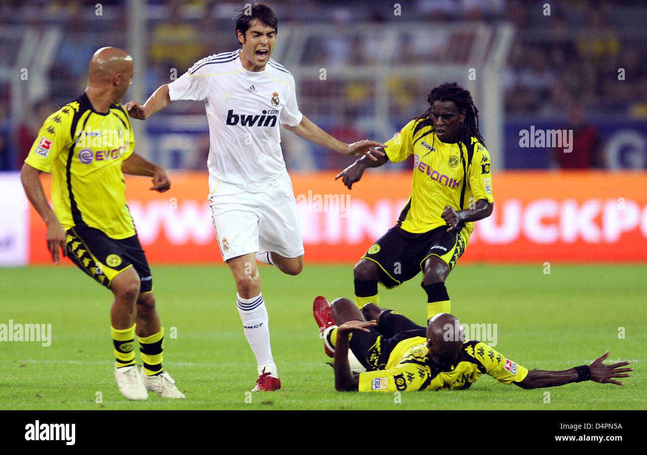 Dortmund?s Dede (L), Felipe Santana (bottom) and Tinga (R) fight for ...