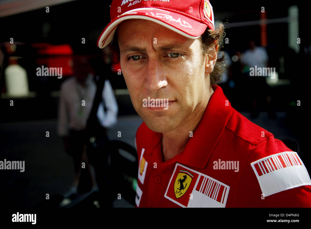 Italian Formula One driver Luca Badoer of Scuderia Ferrari walks ...