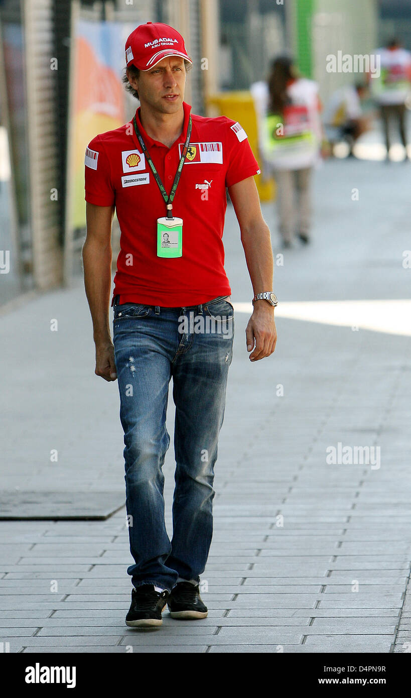 Italian Formula One Driver Luca Badoer of Scuderia Ferrari walks ...