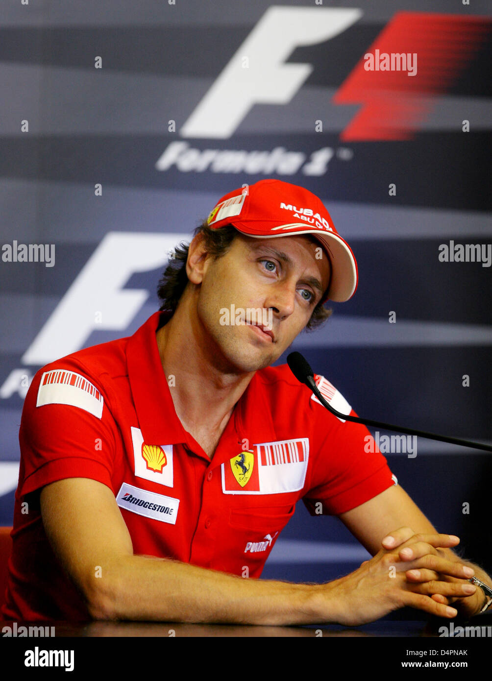 Italian Formula One Driver Luca Badoer of Scuderia Ferrari sits in a ...