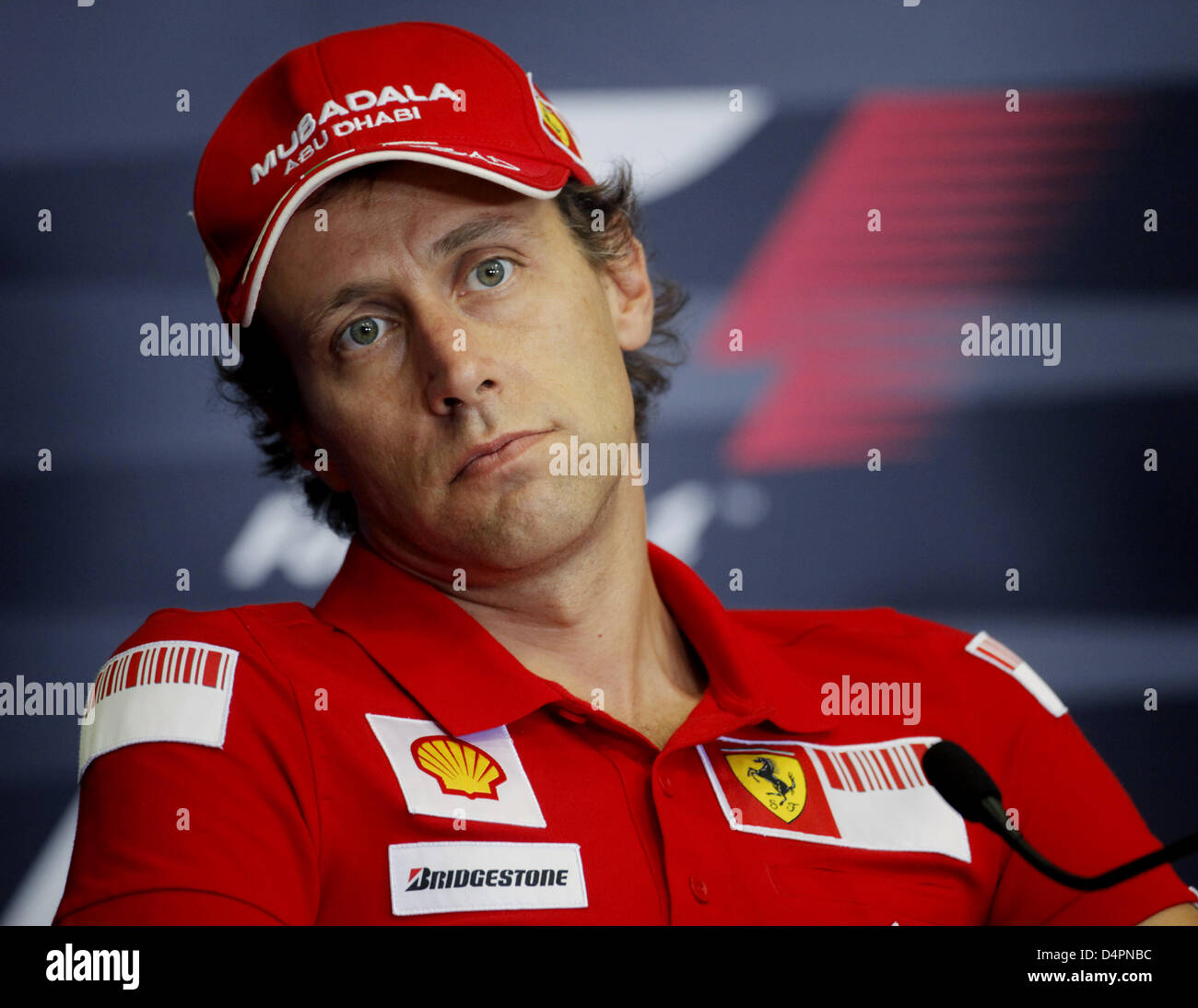 Italian Formula One Driver Luca Badoer of Scuderia Ferrari sits in a ...