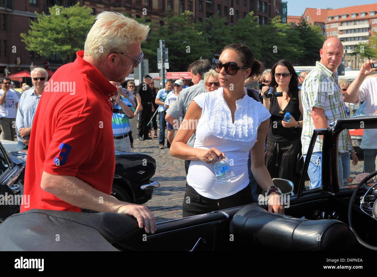 Lilly Becker and her husband tennis legend Boris Becker look at cars on ...