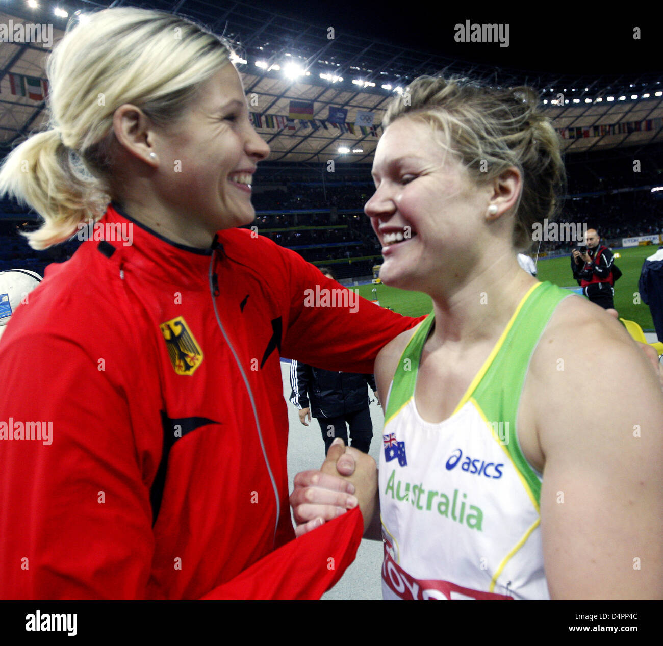 German Nadine Mueller (L) congratulates Australian Dani Samuels for ...