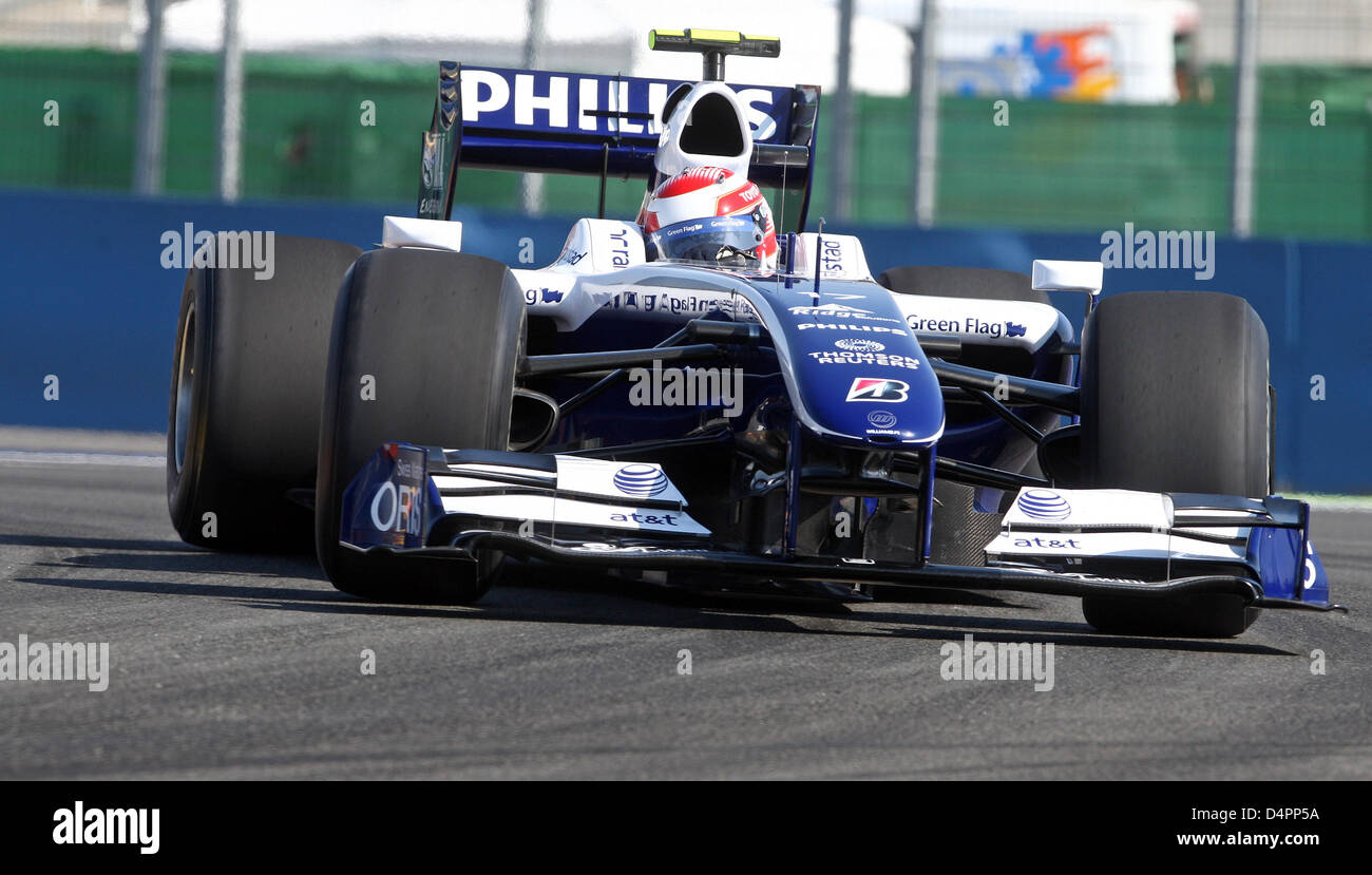 Japanese Formula One driver Kazuki Nakajima of Williams F1 steers his ...