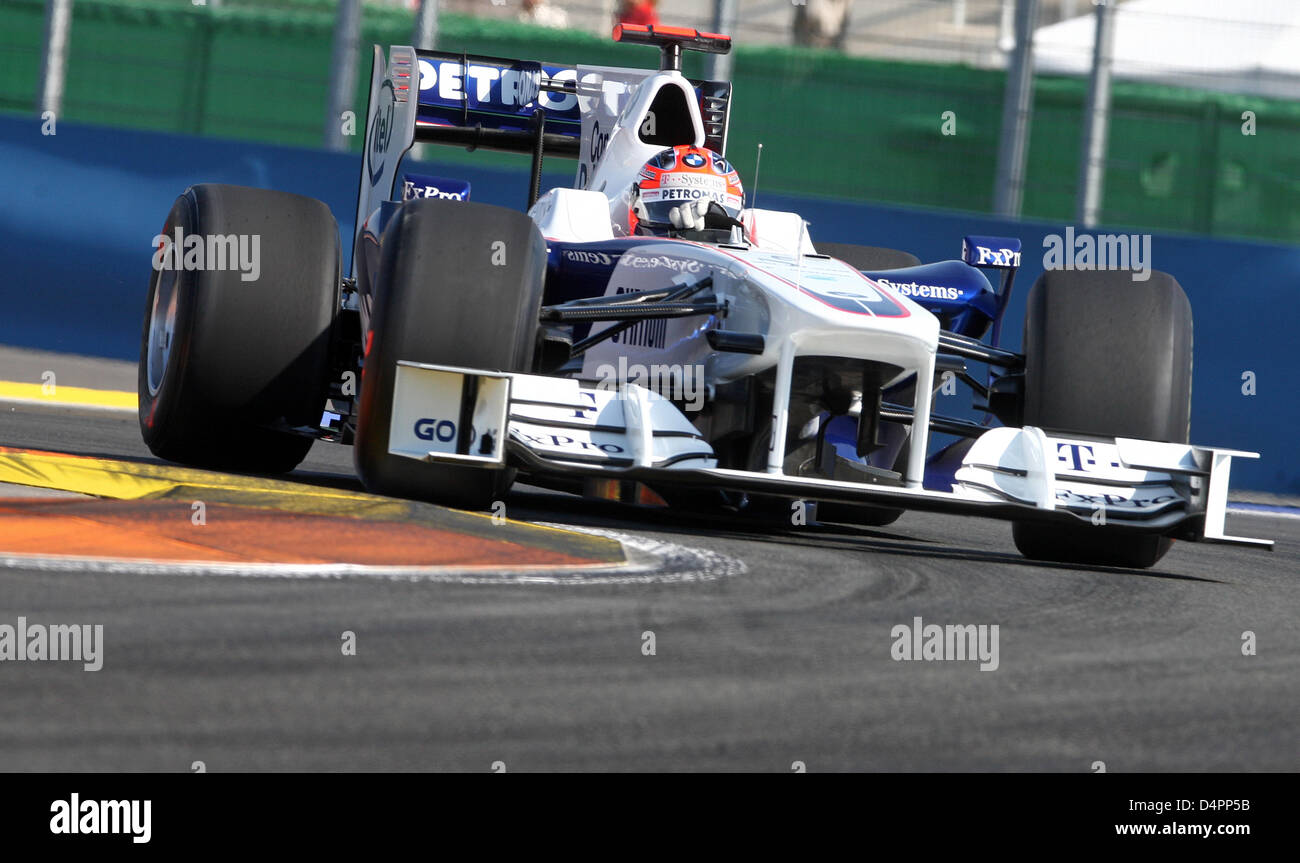 Polish Formula One driver Robert Kubica of BMW Sauber steers his car ...