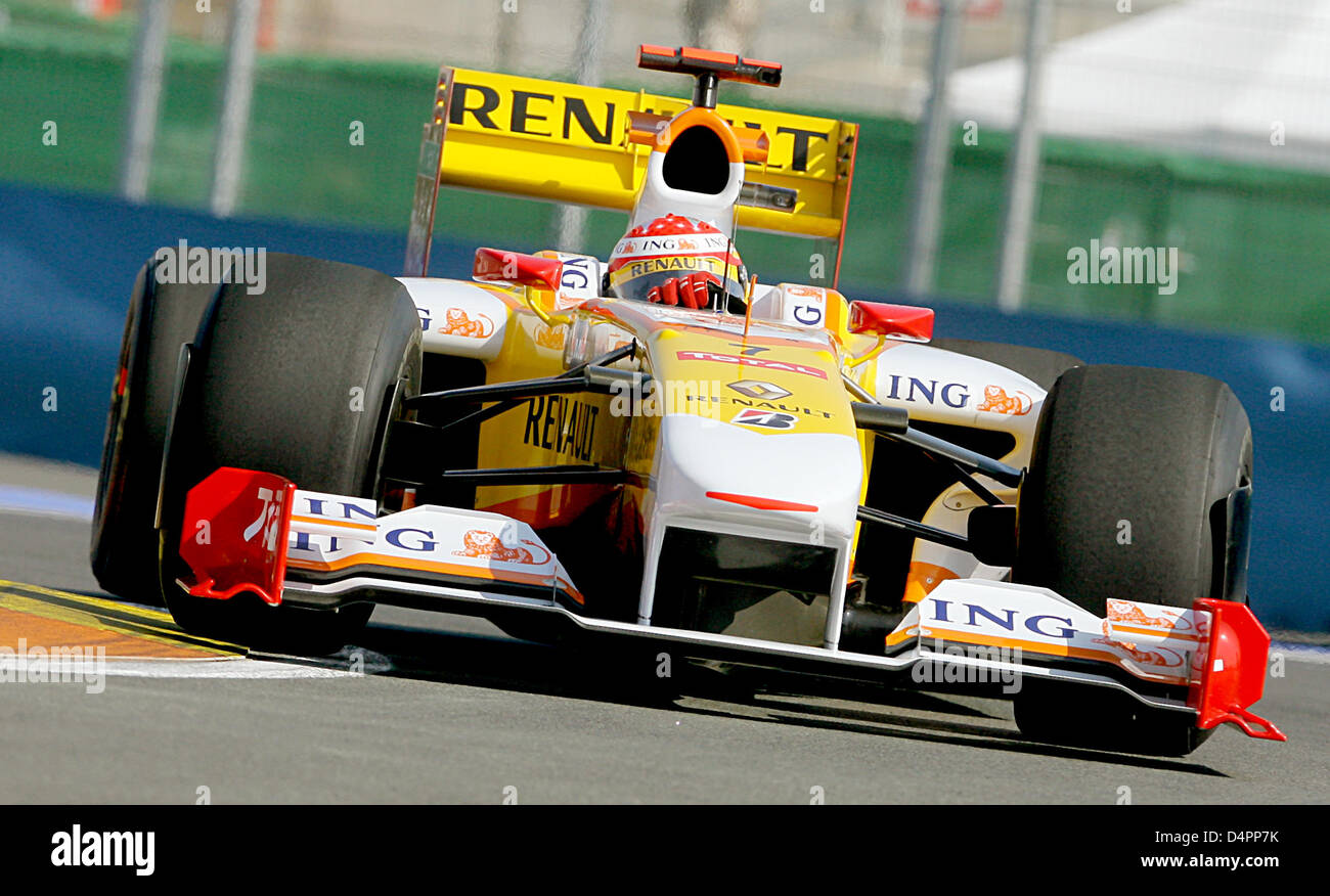 Spanish Formula One driver Fernando Alonso of Renault steers his car ...