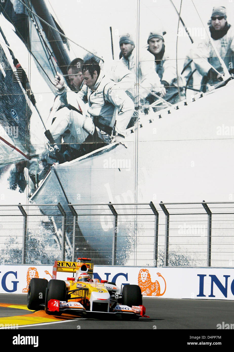 Spanish Formula One driver Fernando Alonso of Renault steers his car during the first practise ...