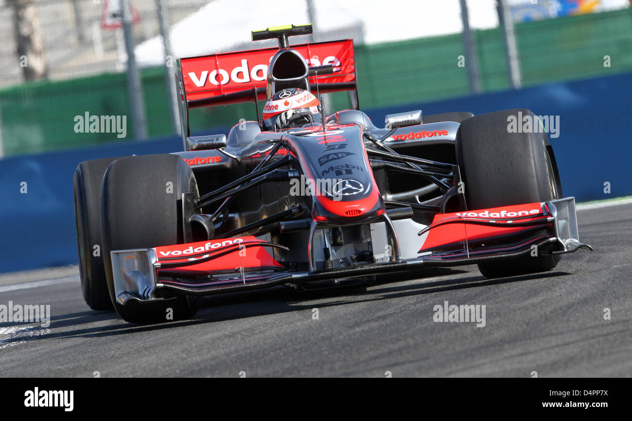 Finnish Formula One driver Heikki Kovalainen of McLaren Mercedes steers ...