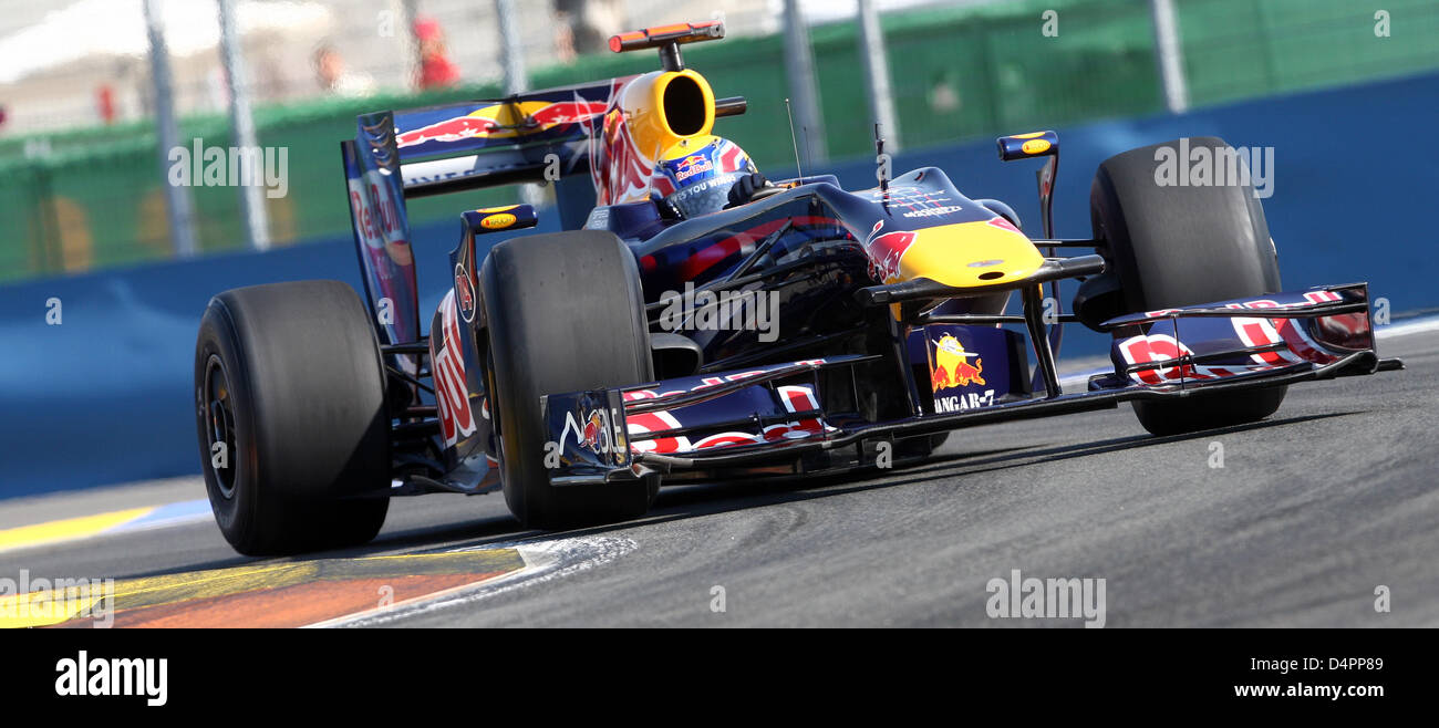 Australian Formula One driver Mark Webber of Red Bull steers his car ...