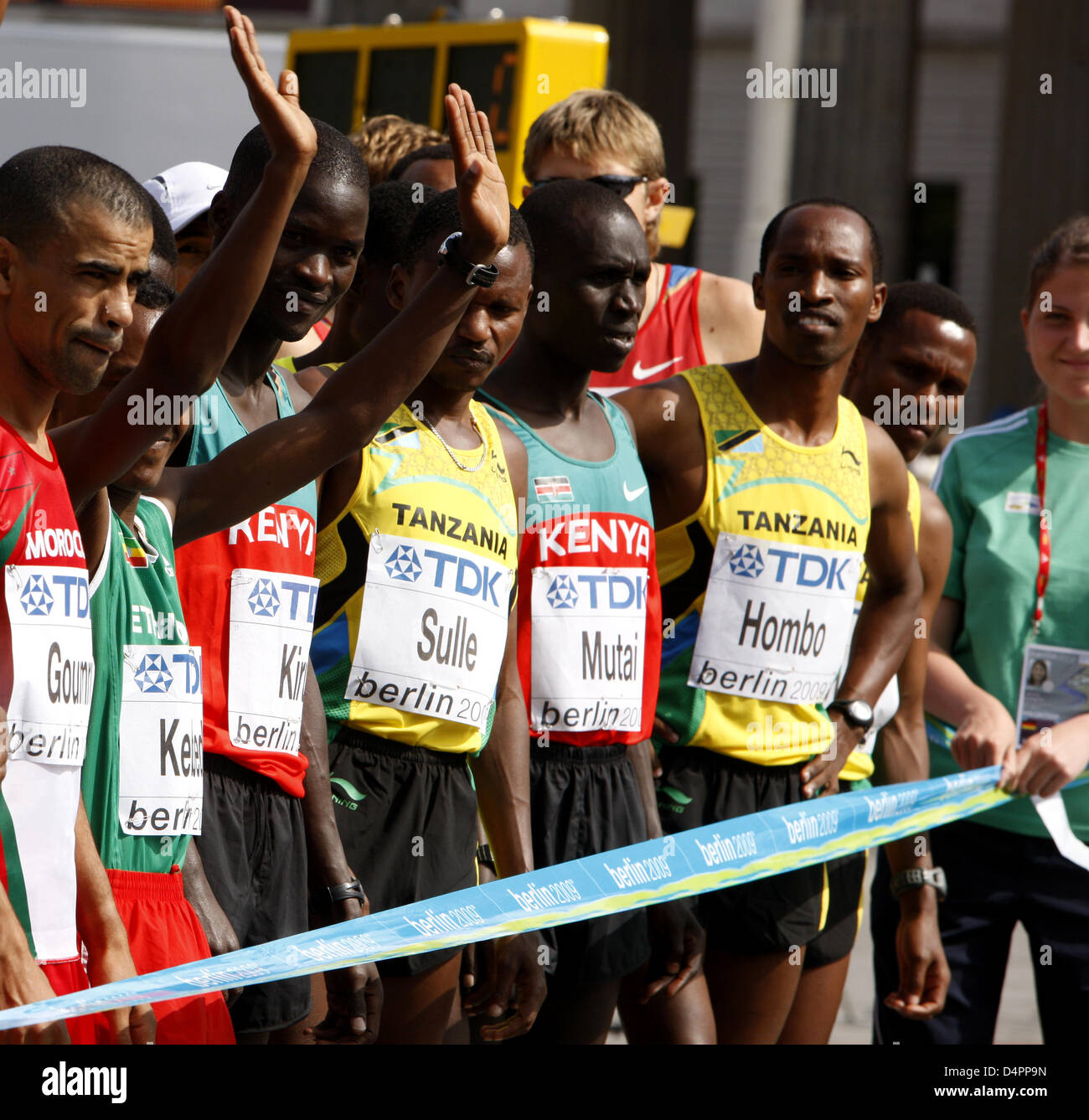 Abel Kirui (3-L) of Kenya, Phaustin Baha Sulle (4-L) of Tanzania and ...