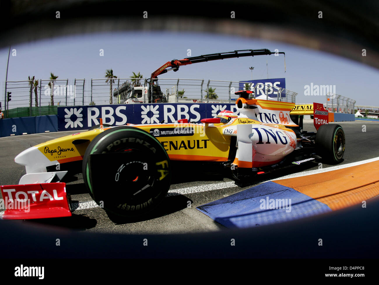 Spanish Formula One driver Fernando Alonso of Renault F1 Team steers his car during the ...