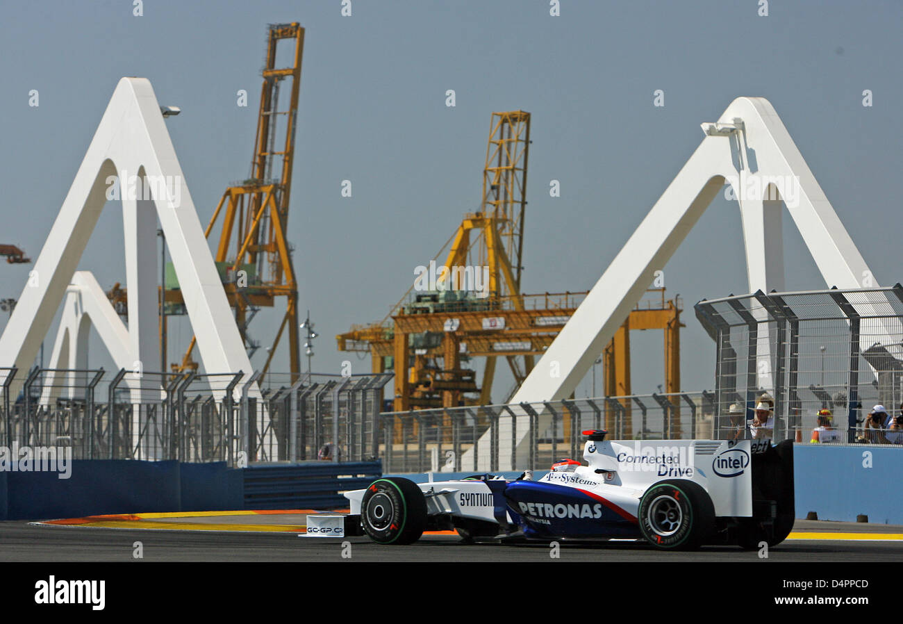 Polish Formula One driver Robert Kubica of BMW Sauber steers his car ...