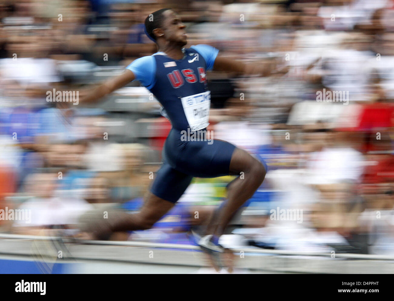 Dwight Phillips of the US celebrates winning the gold medal in the Long ...