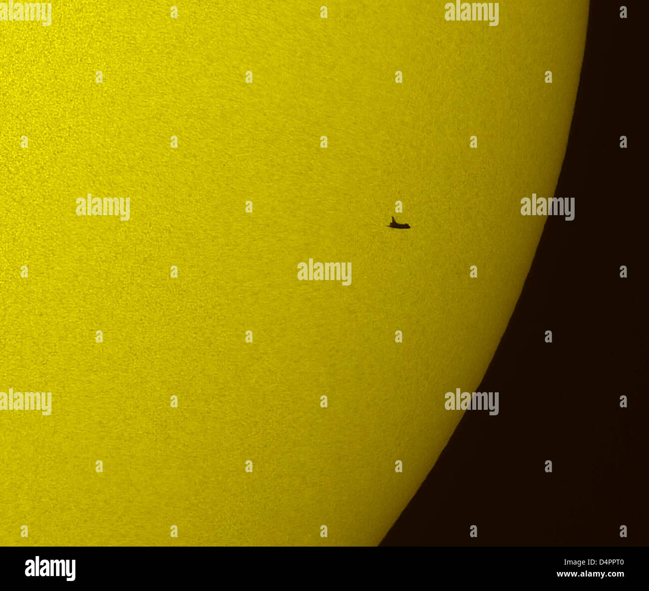 STS-125 Space Shuttle Atlantis captured a rare solar transit as it ...