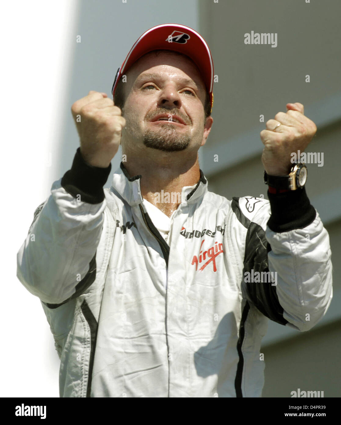 Brazilian Formula One driver Rubens Barrichello of Brawn GP celebrates ...