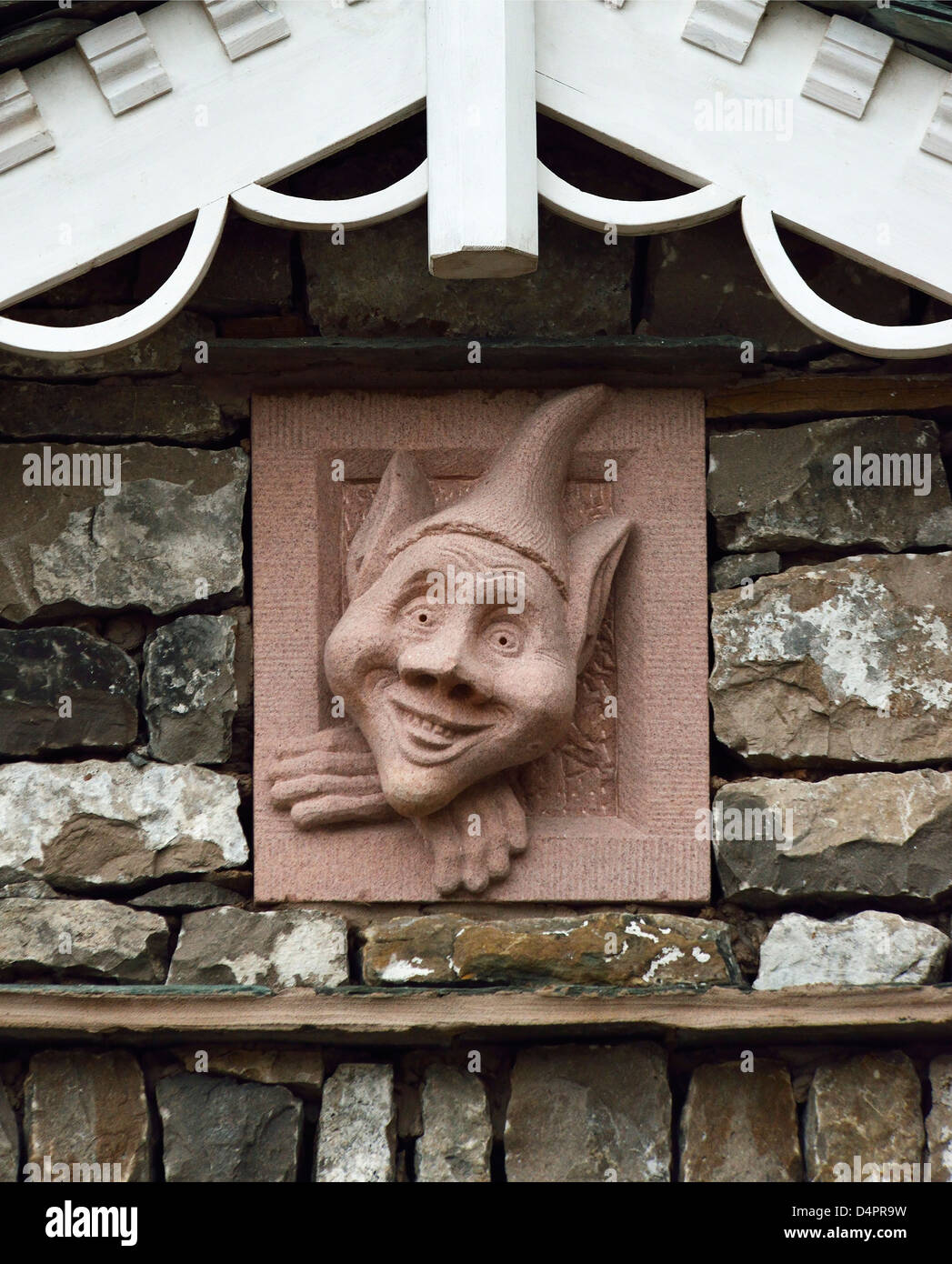 Imp sculpture on house. Fleece Inn Yard, Kendal, Cumbria, England ...
