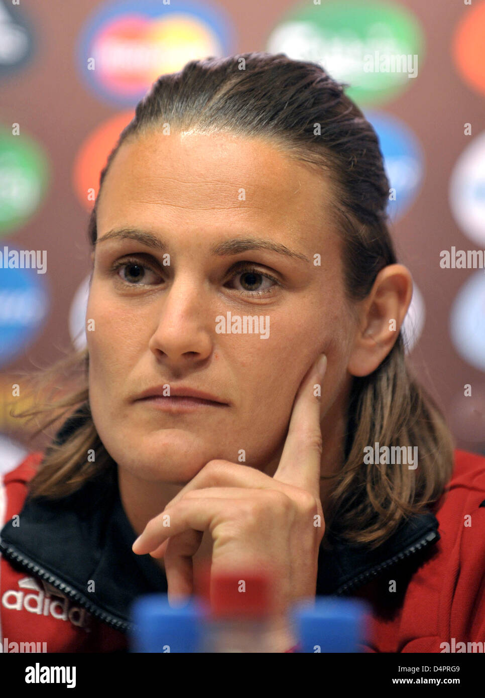Nadine Angerer, goalkeeper of Germany?s national soccer team, listens ...