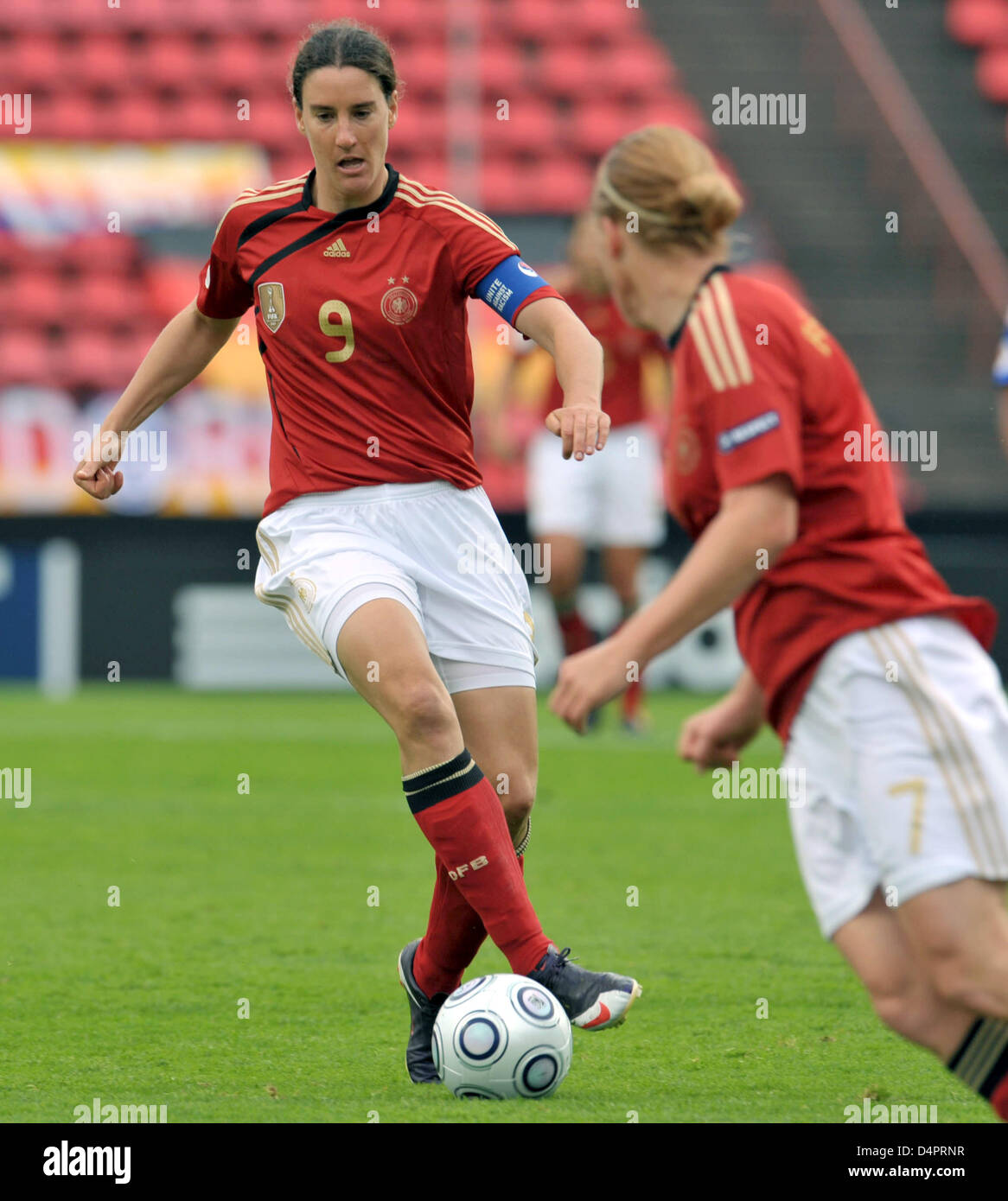 Germany?s Birgit Prinz (L) shown in action during the group match ...