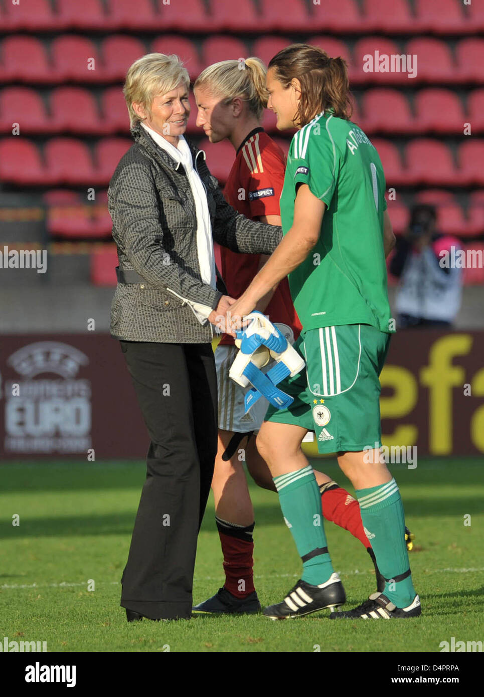 Germany?s national coach Silvia Neid (L) celebrates with goalkeeper ...