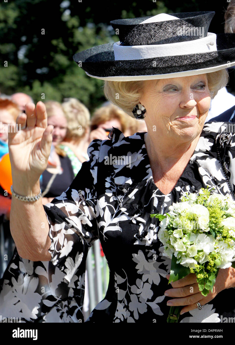 Queen Beatrix of the Netherlands visits the village Ommen during her ...
