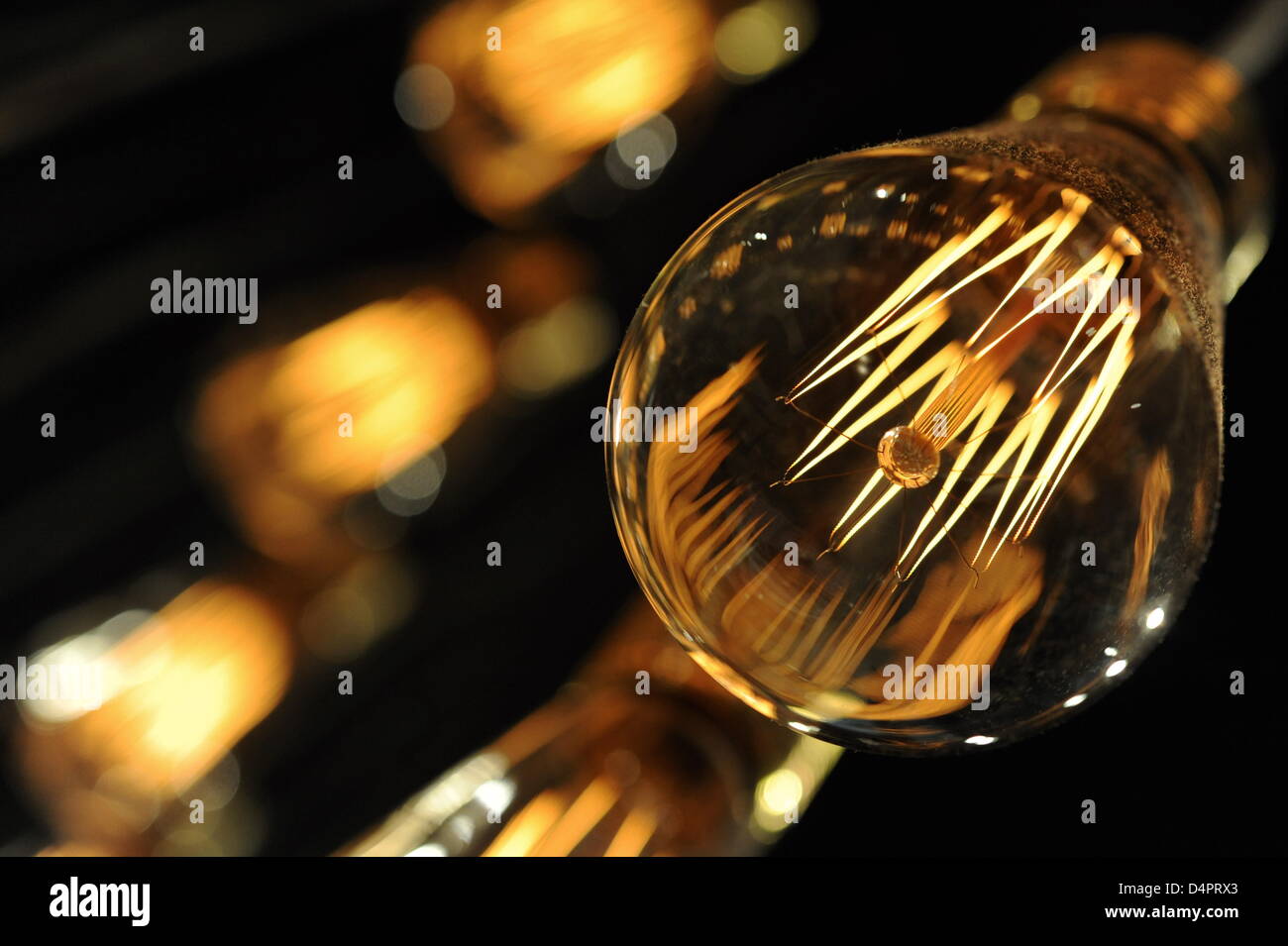 Light bulbs with special filaments are used as decorations in a clothes ...