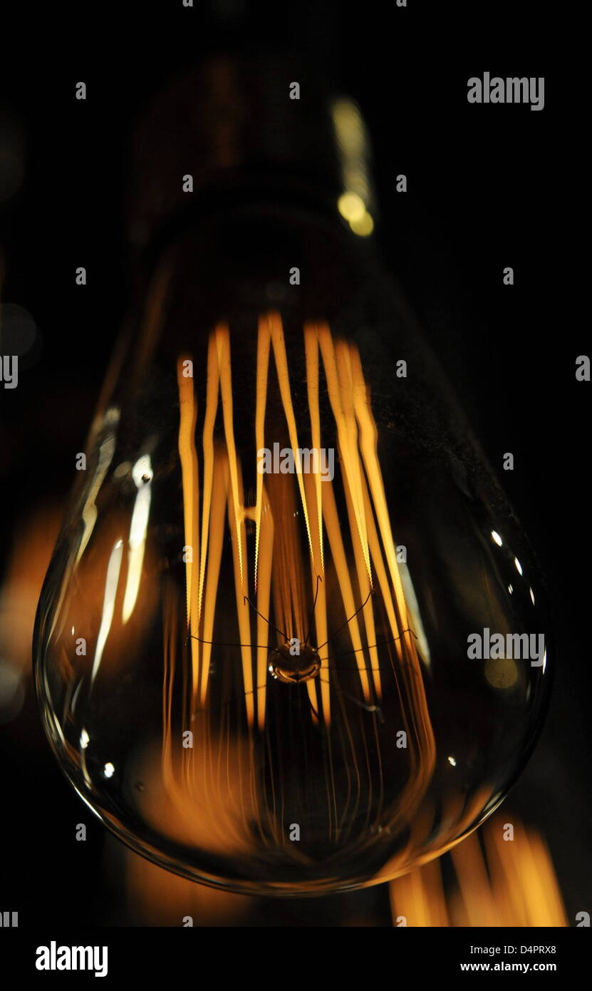 Light bulbs with special filaments are used as decorations in a clothes ...