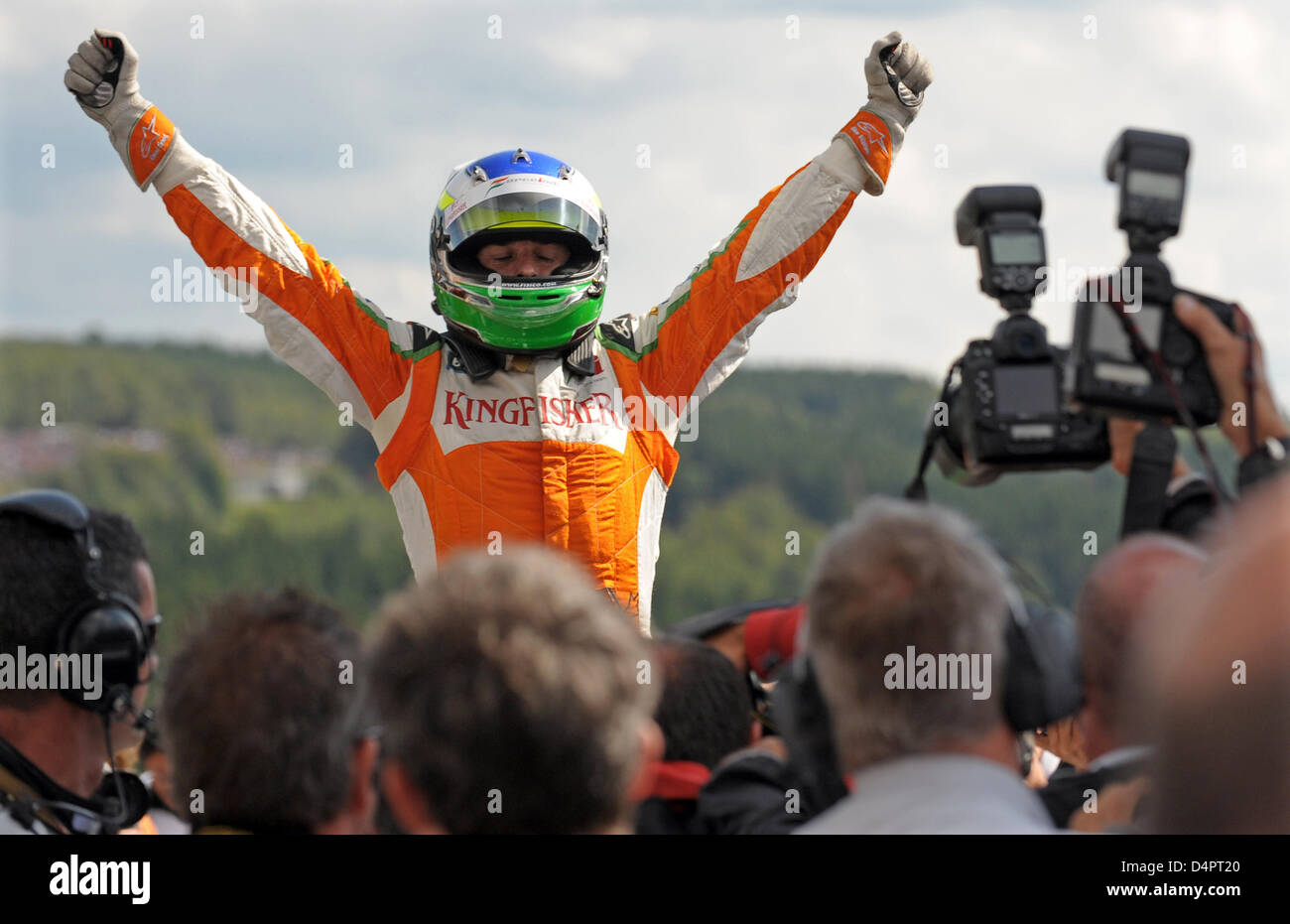 Italian Formula One driver Giancarlo Fisichella of Force India cheers ...