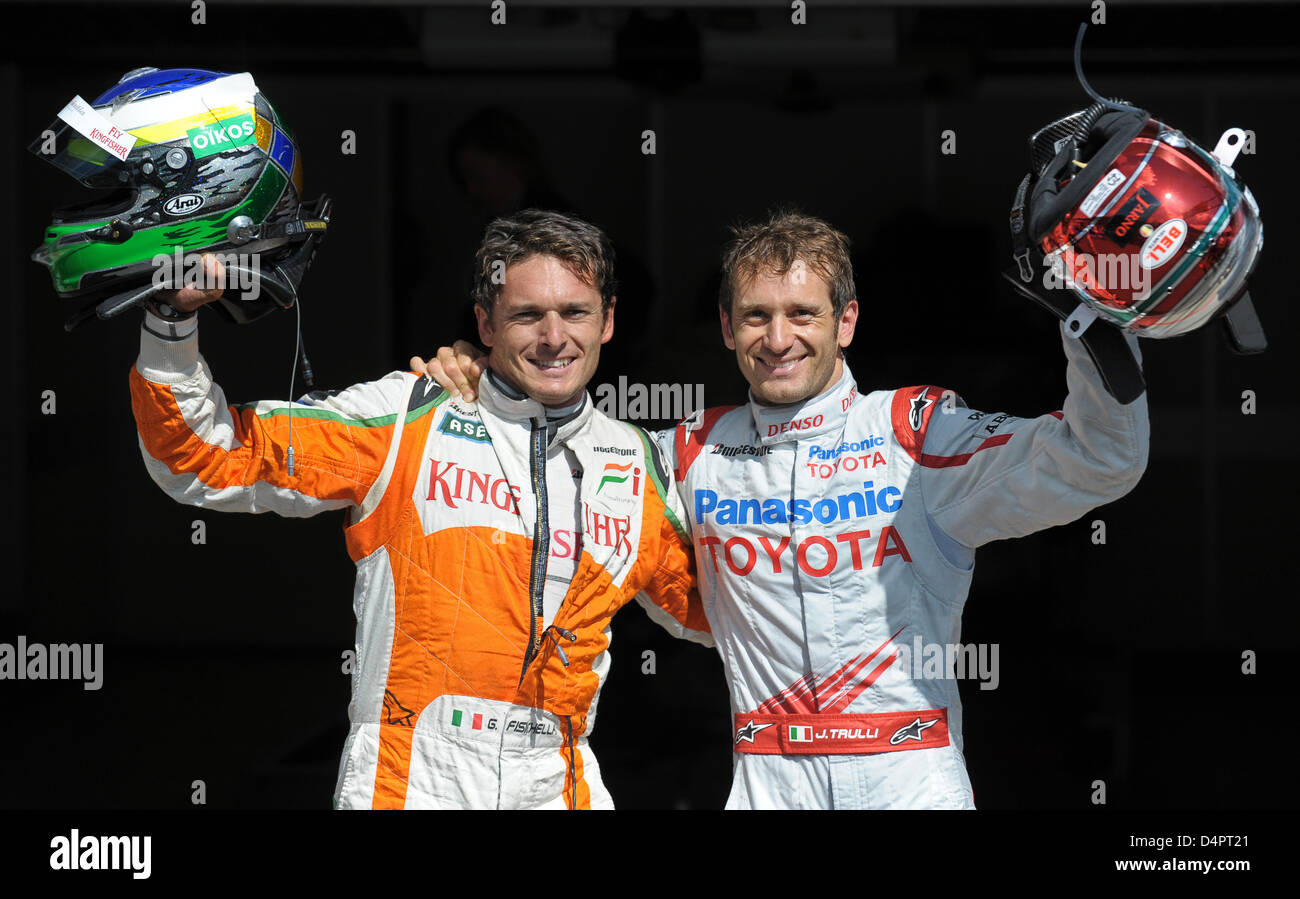 Italian Formula One driver Giancarlo Fisichella of Force India (L) and ...