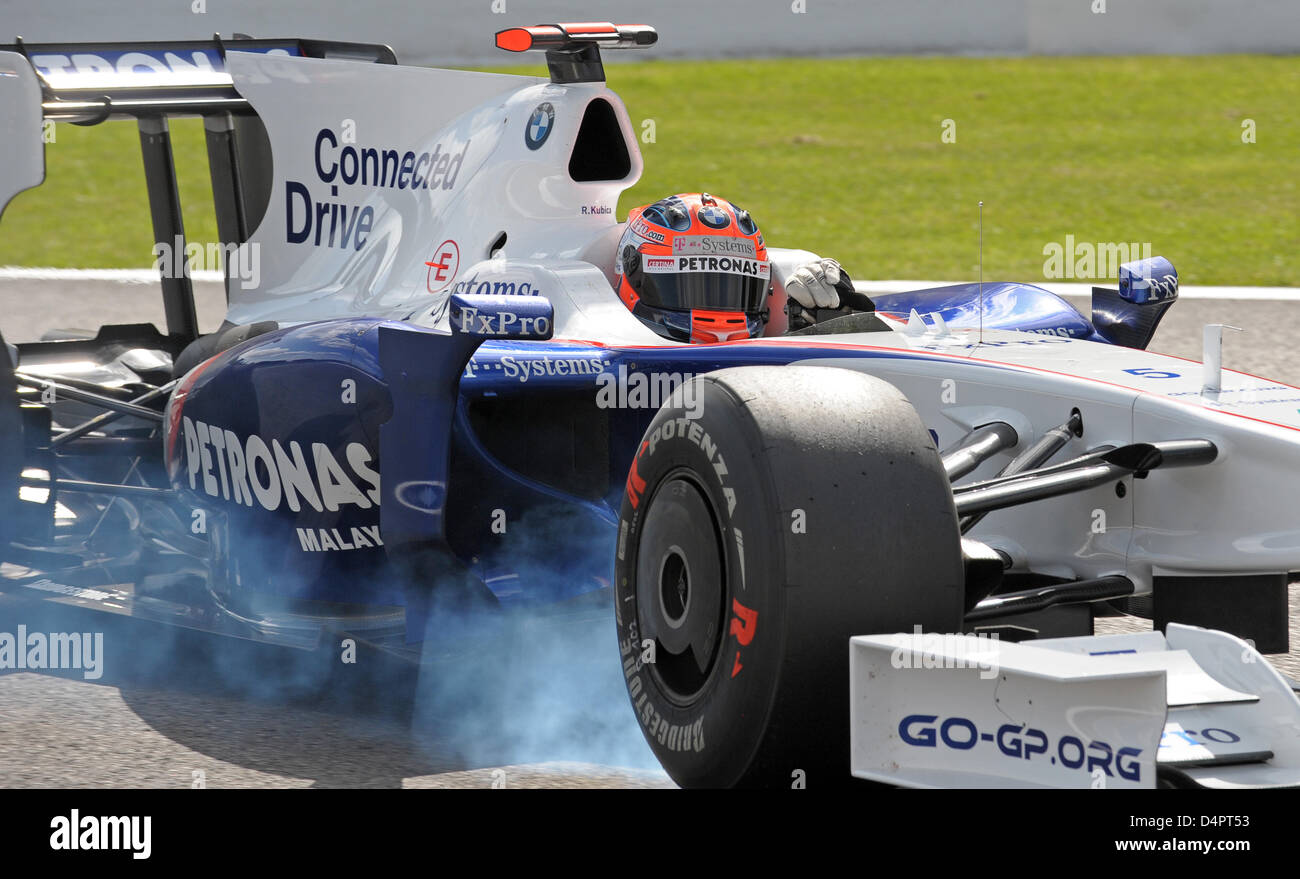 Polish Formula One driver Robert Kubica of BMW Sauber steers his car ...