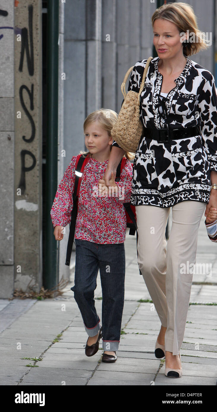 Princess Mathilde of Belgium (R) accompanies her daughter Princess ...