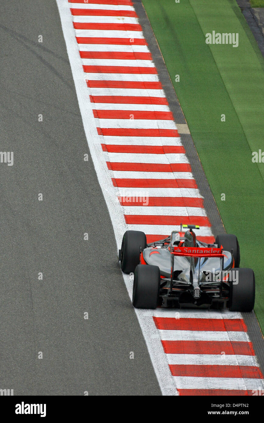Finnish Formula One driver Heikki Kovalainen of McLaren Mercedes steers ...