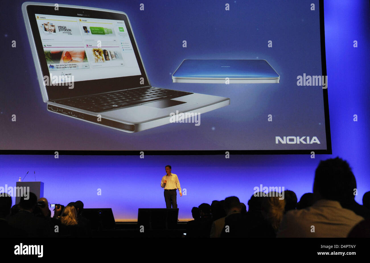 Nokia?s president Olli-Pekka Kallasvuo gives a speech below a ...