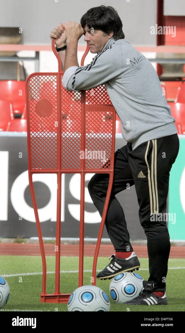 Joachim Loew, head coach of the German national soccer team, supervises ...