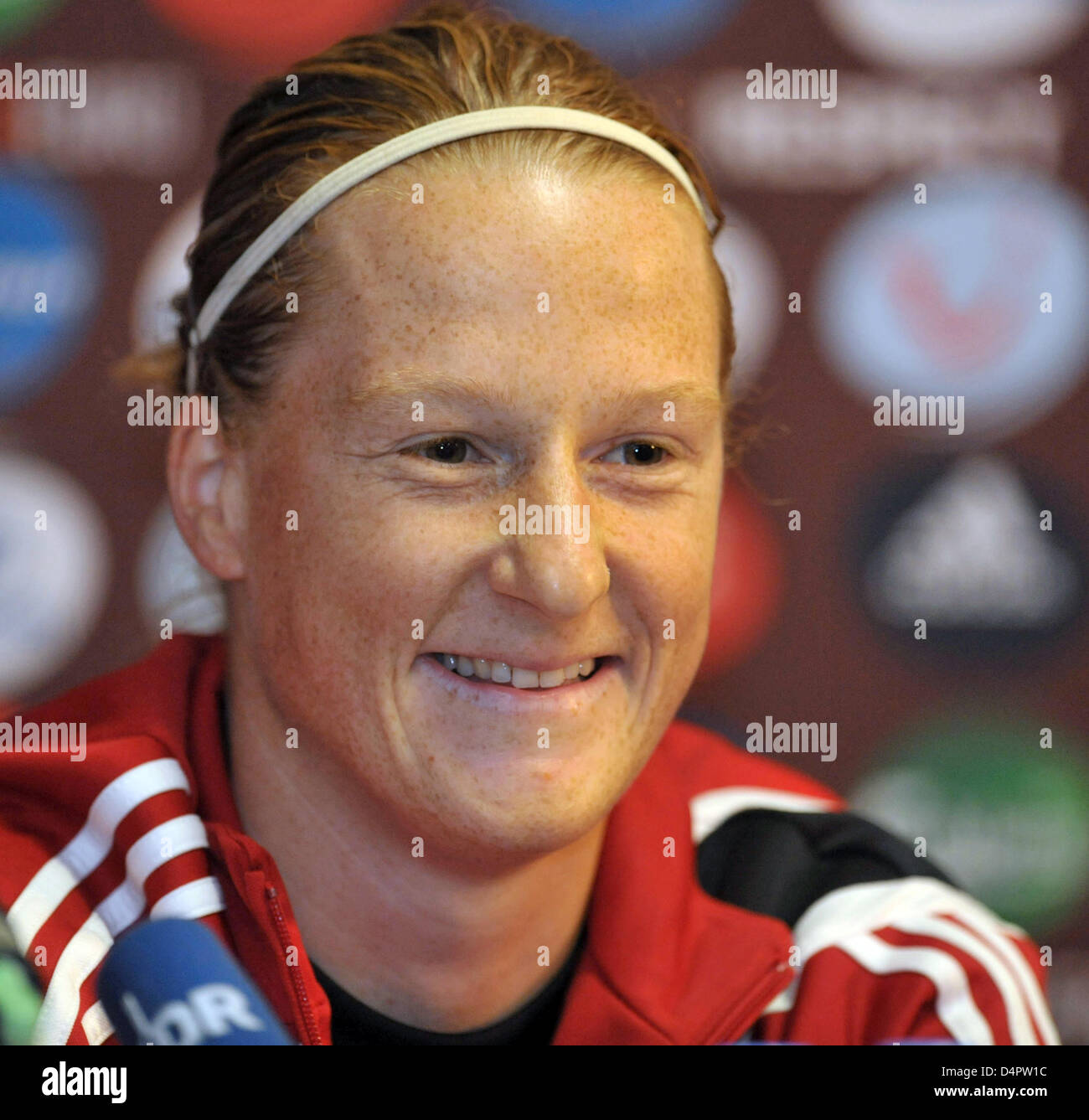 Player Melanie Behringer speaks during a press conference at Lahti ...