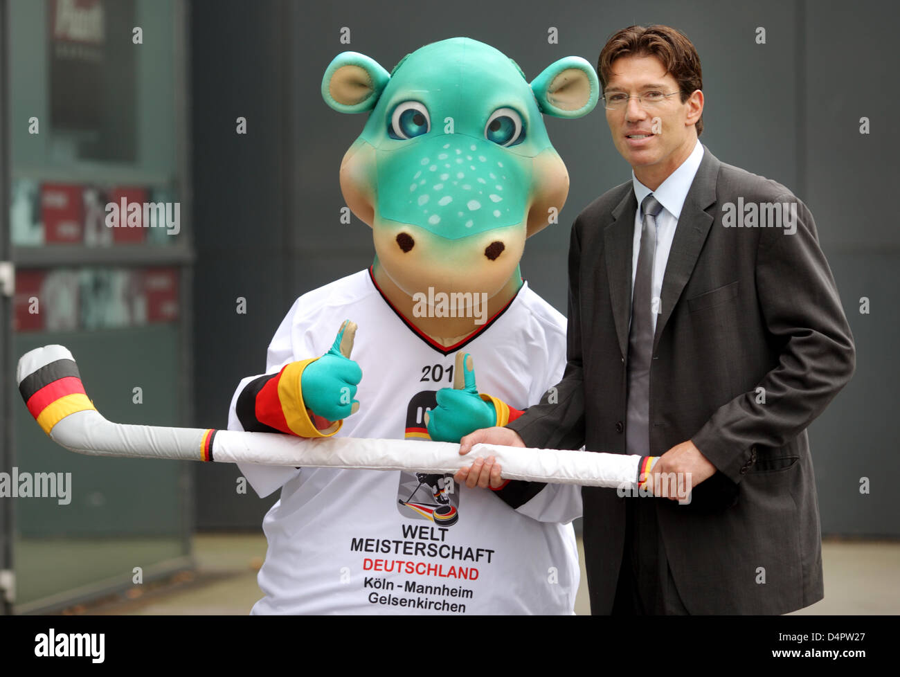 Uwe Krupp, head coach of Germany?s national ice hockey team, poses with ...