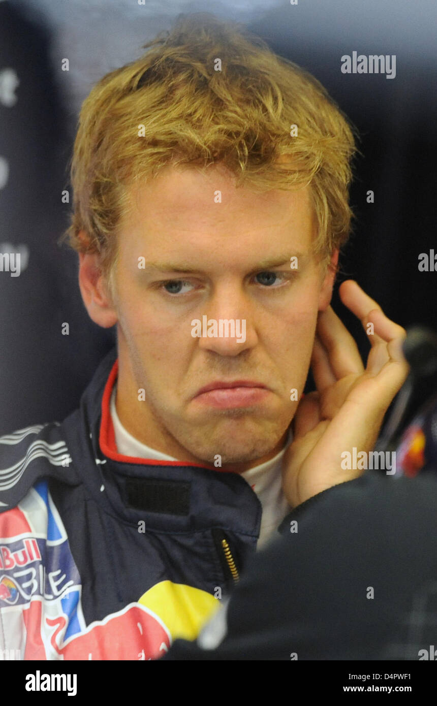 German Formula One driver Sebastian Vettel of Red Bull in his pit ...