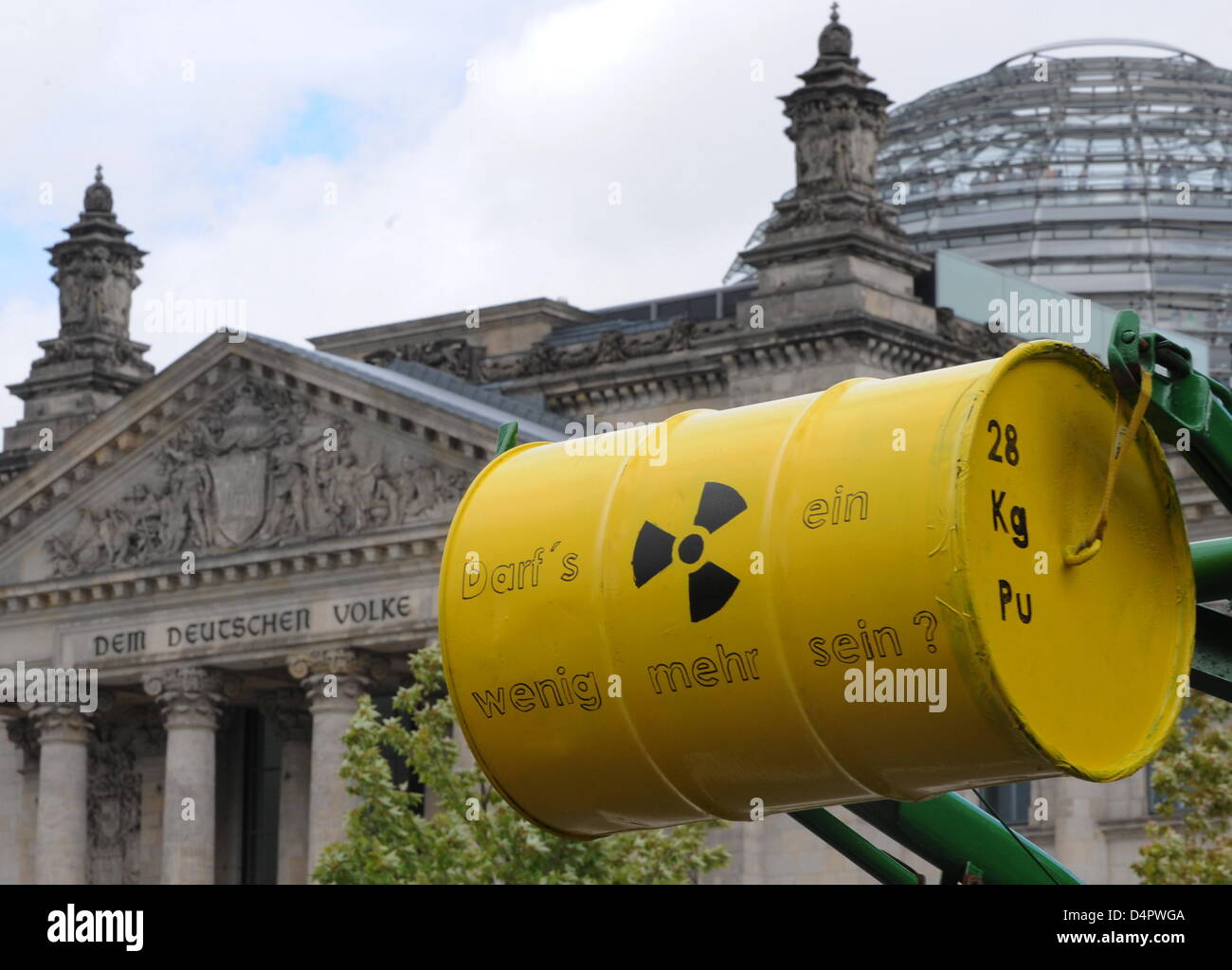 Anti atomic energy activists parade with dummy atomic waste containers ...
