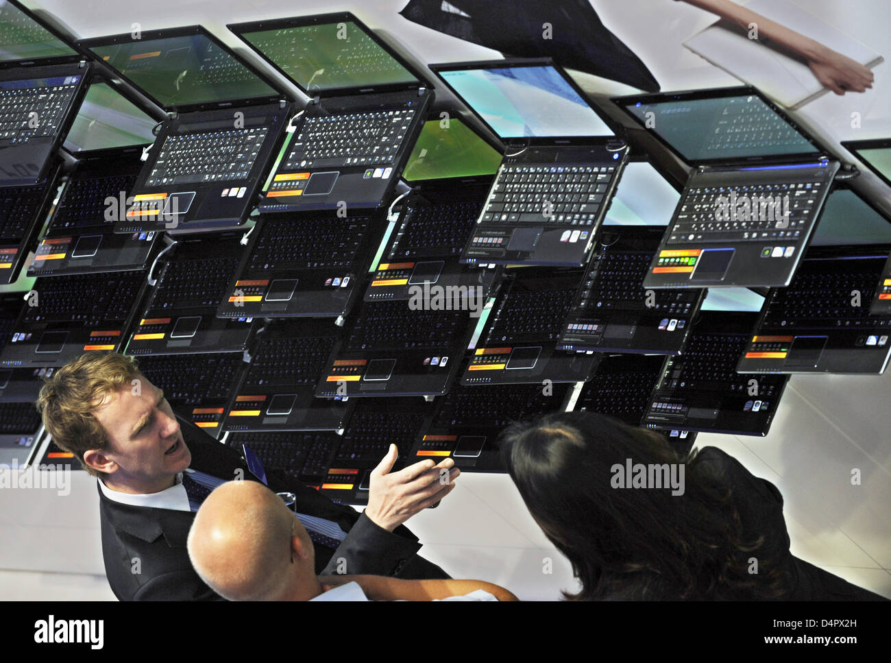 Visitors eye laptops by Siemens at the IFA 2009 in Berlin, Germany, 06 ...
