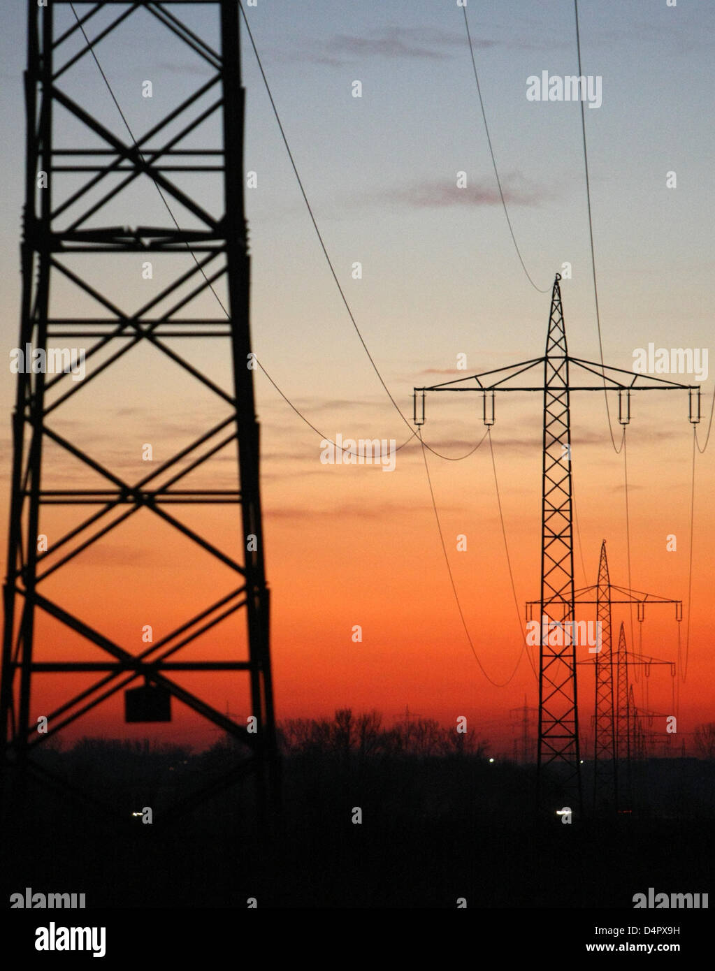 (dpa file) - Electricity pylons at dusk near Freiburg, Germany, 23 ...