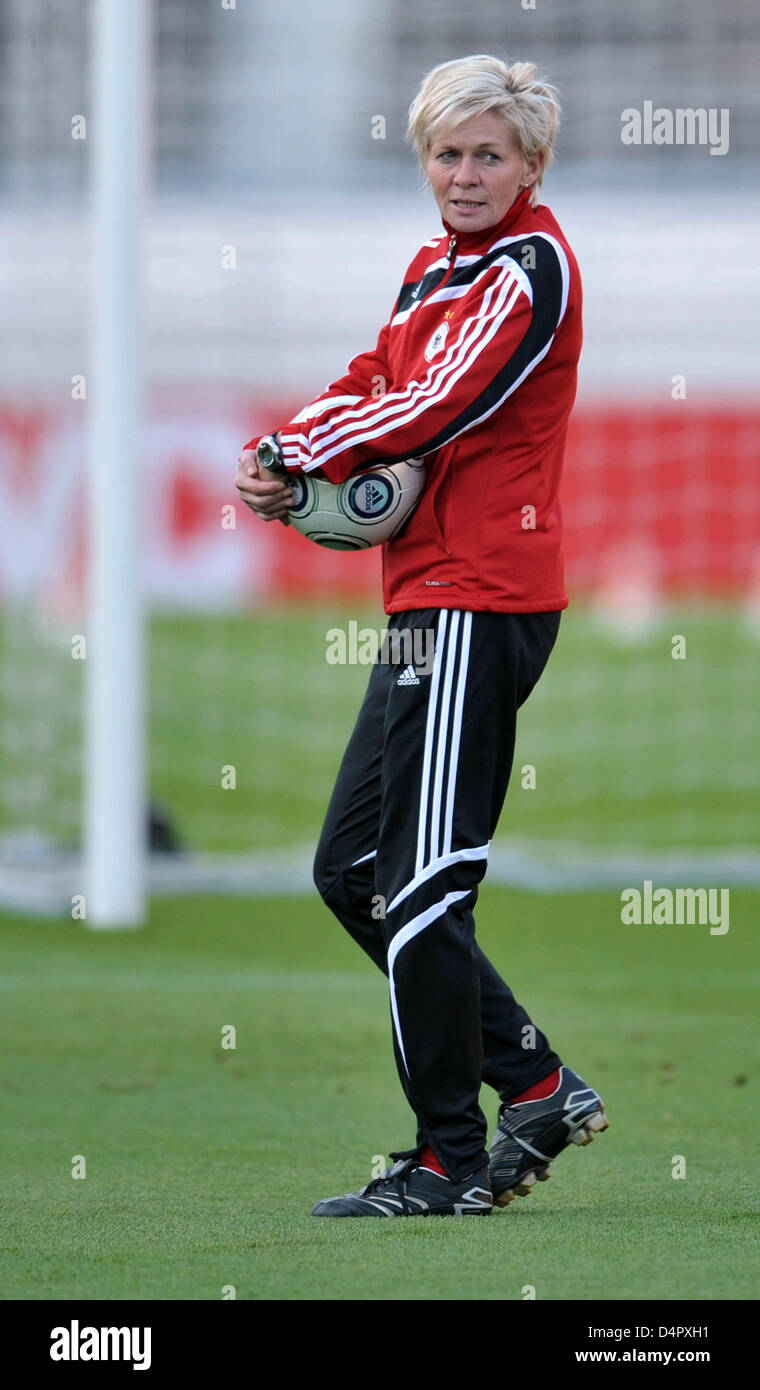 Silvia Neid, head coach of the German national soccer team, follows her ...